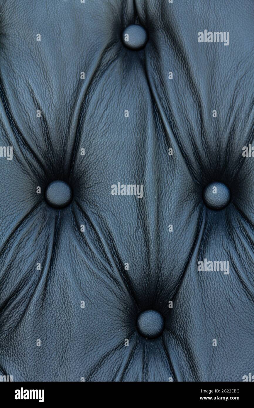 Black genuine leather sofa pattern as background image Stock Photo - Alamy