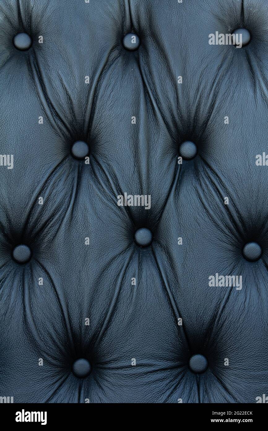 Black genuine leather sofa pattern as background image Stock Photo - Alamy
