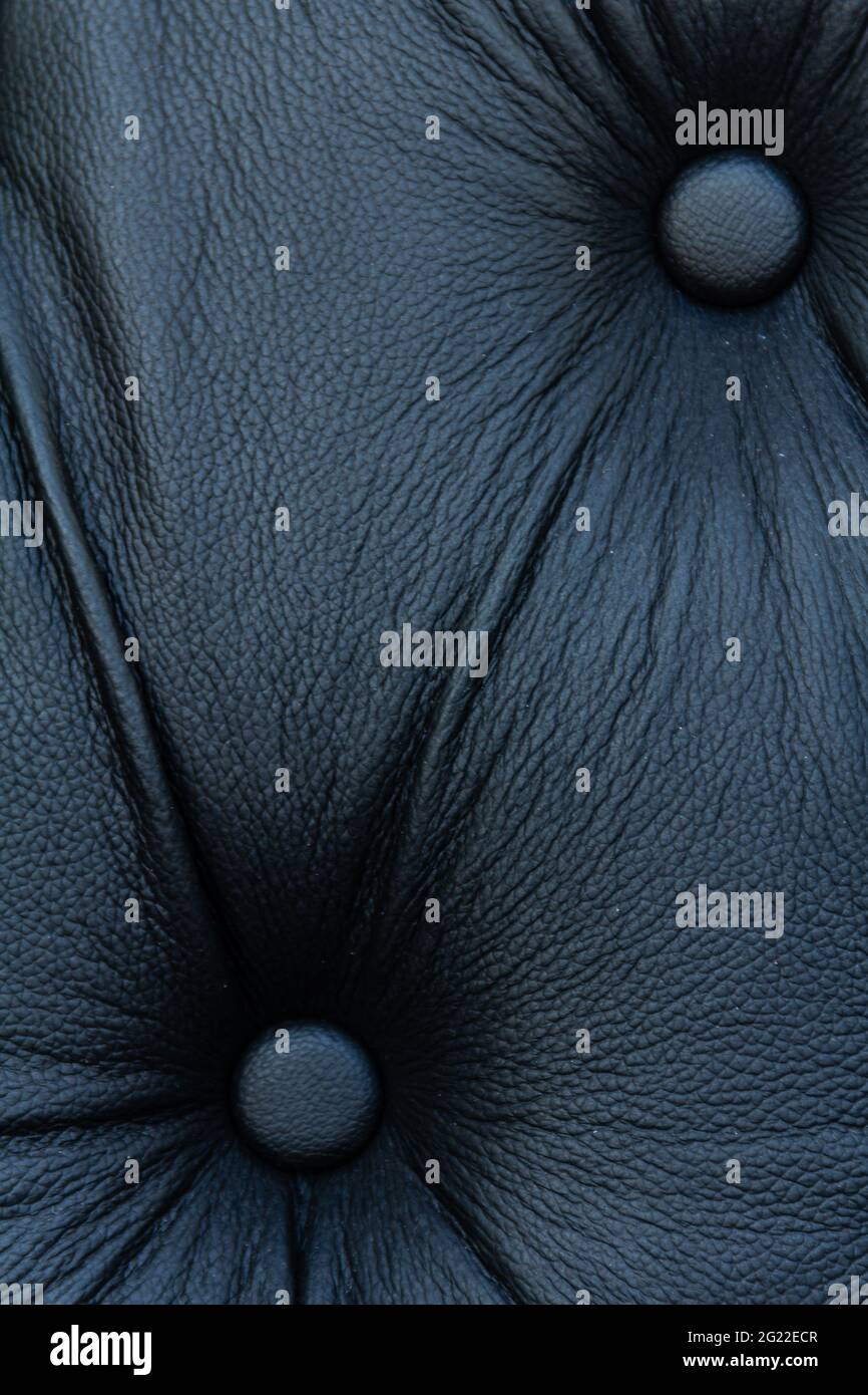 Black genuine leather sofa pattern as background image Stock Photo - Alamy
