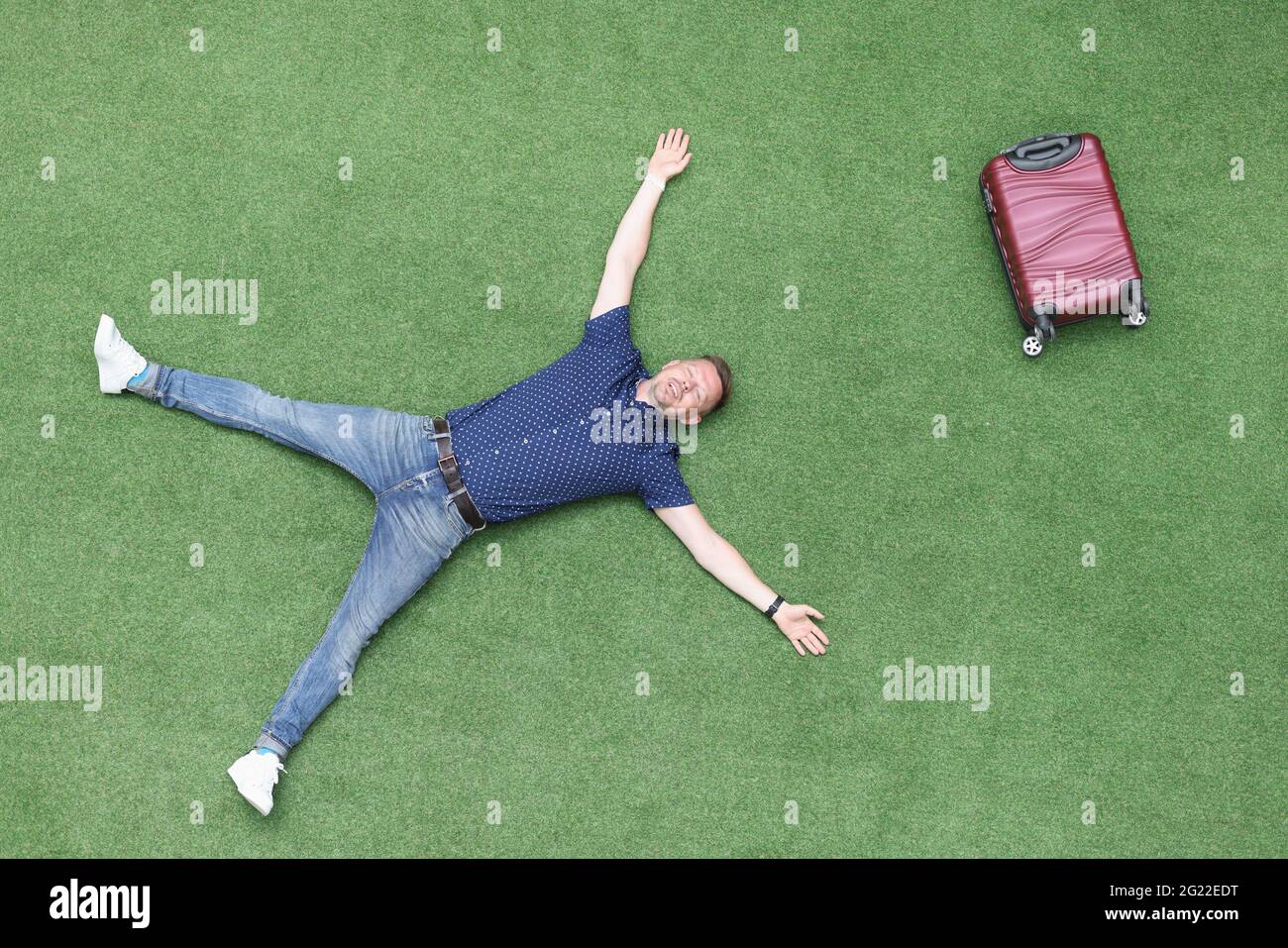 Happy man lies on hi-res stock photography and images - Alamy