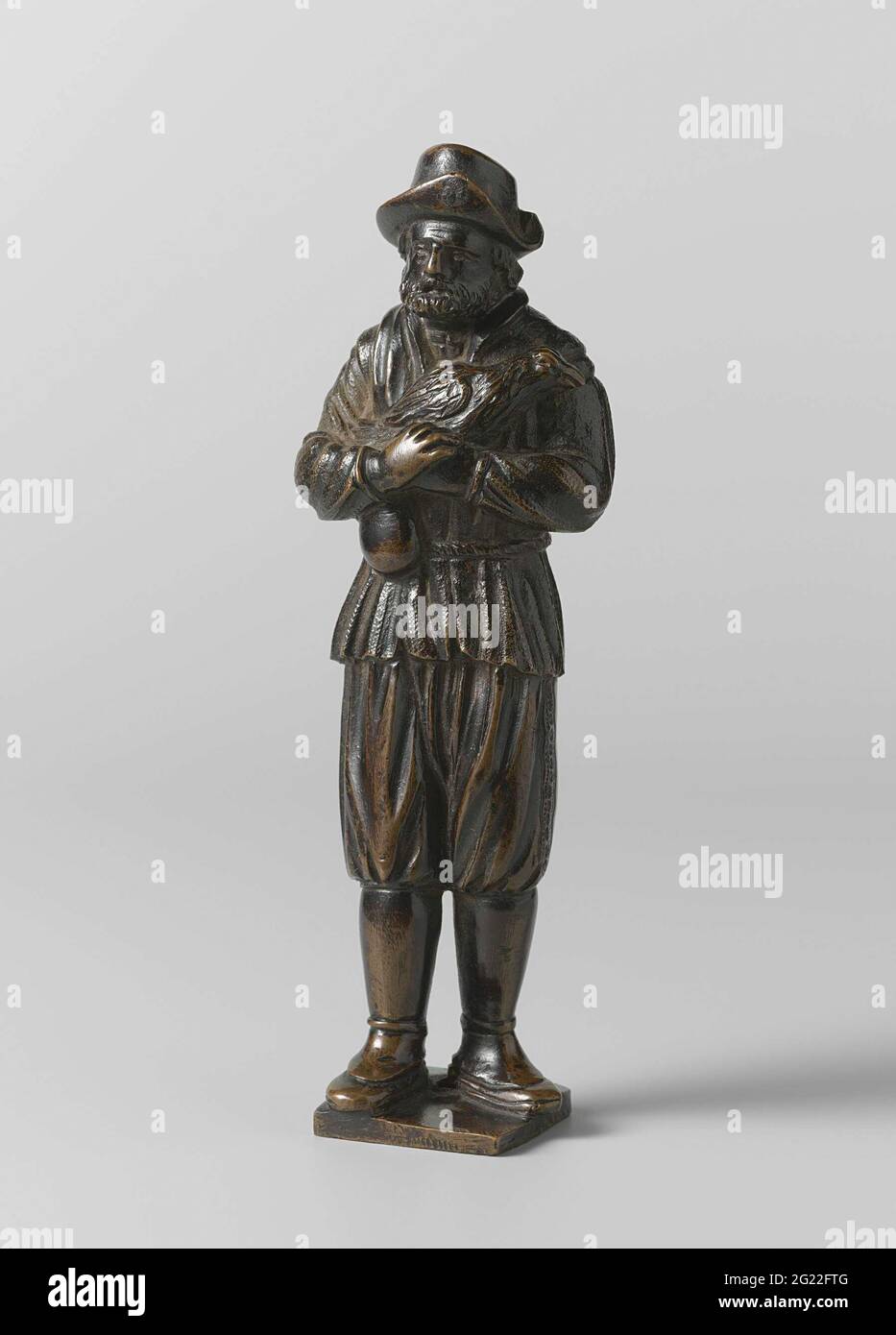 Farmer with bird Stock Photo - Alamy