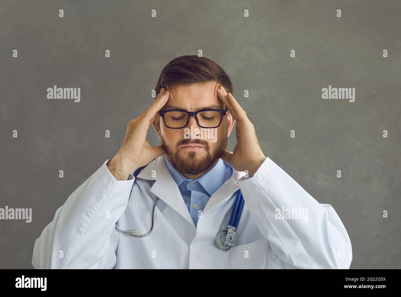 Tired doctor hi-res stock photography and images - Alamy