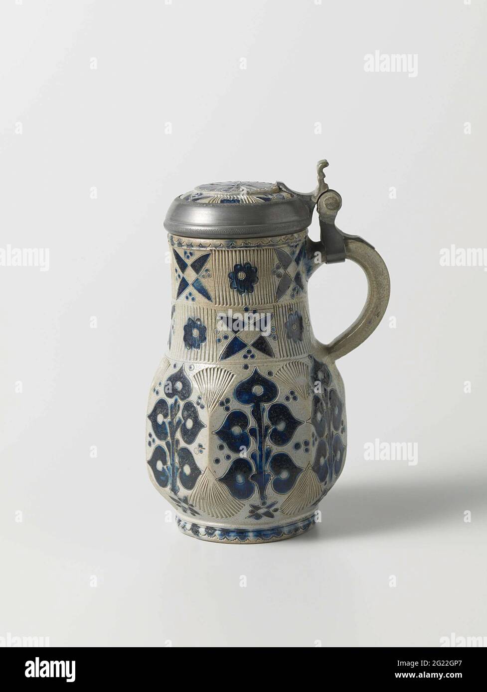 Skew. Can be from stoneware. Skew of shape and decorated with blue ...