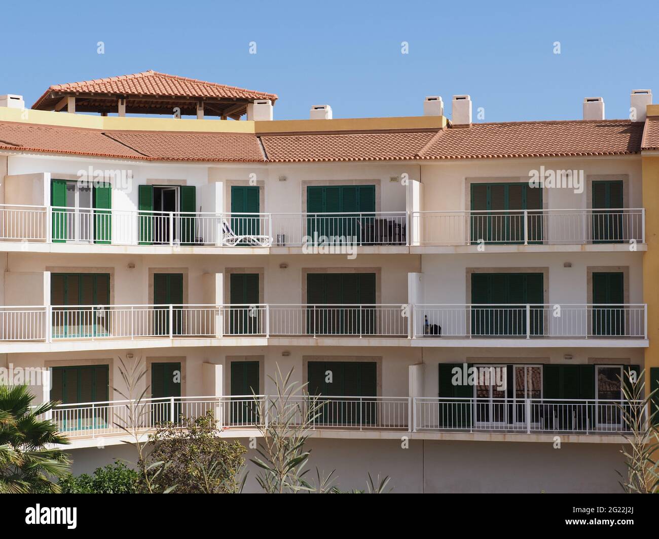 Facade of complex of buildings on african Sal island in Cape Verde with ...