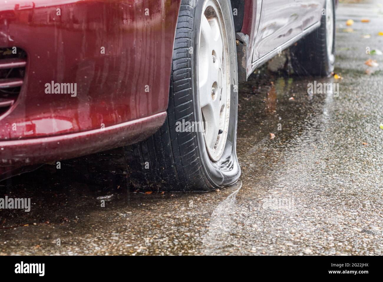 Flat tyre rain hi-res stock photography and images - Alamy