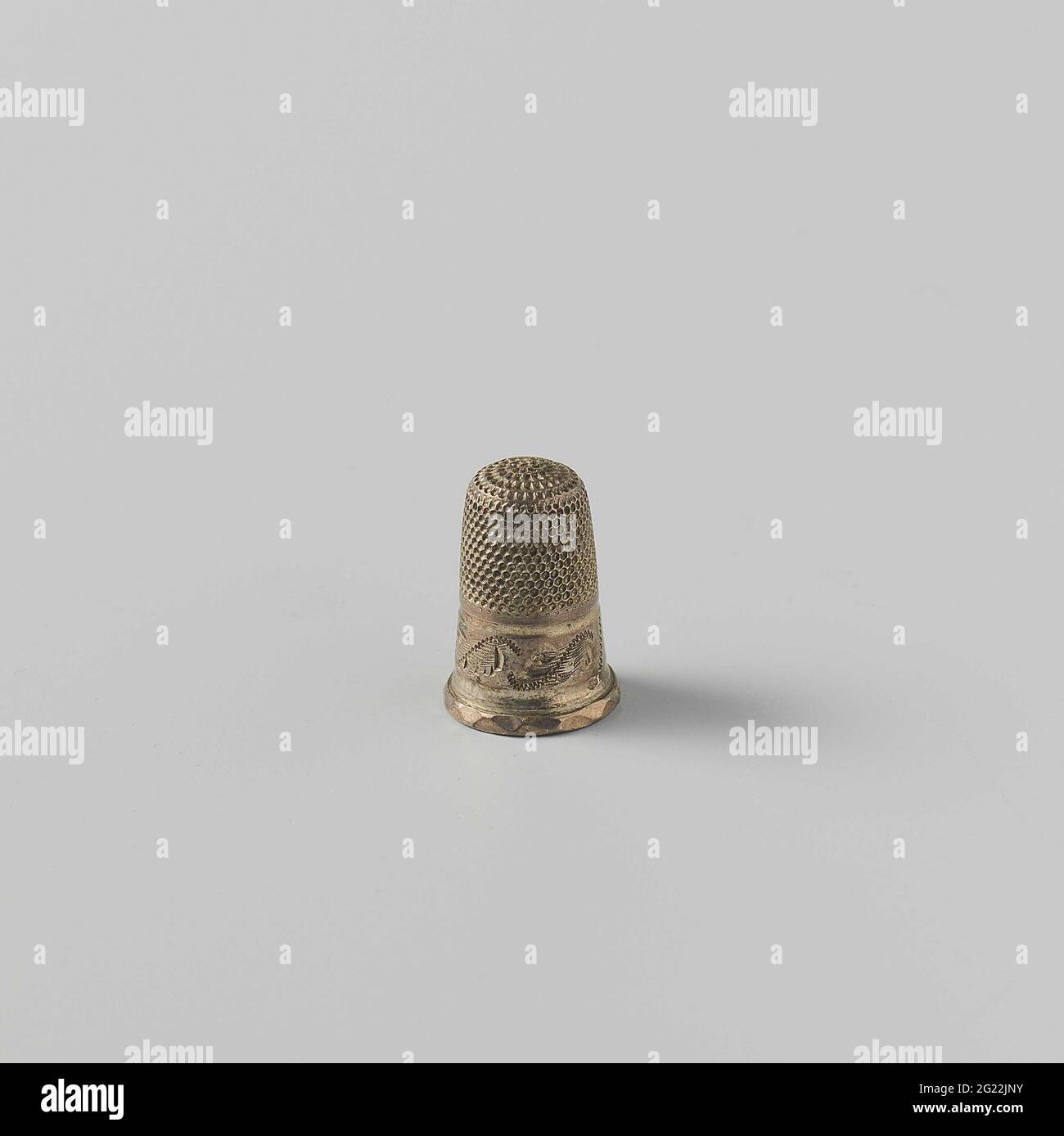 Thimble. Thimble with flattened round top. The edge is bent and edited ...
