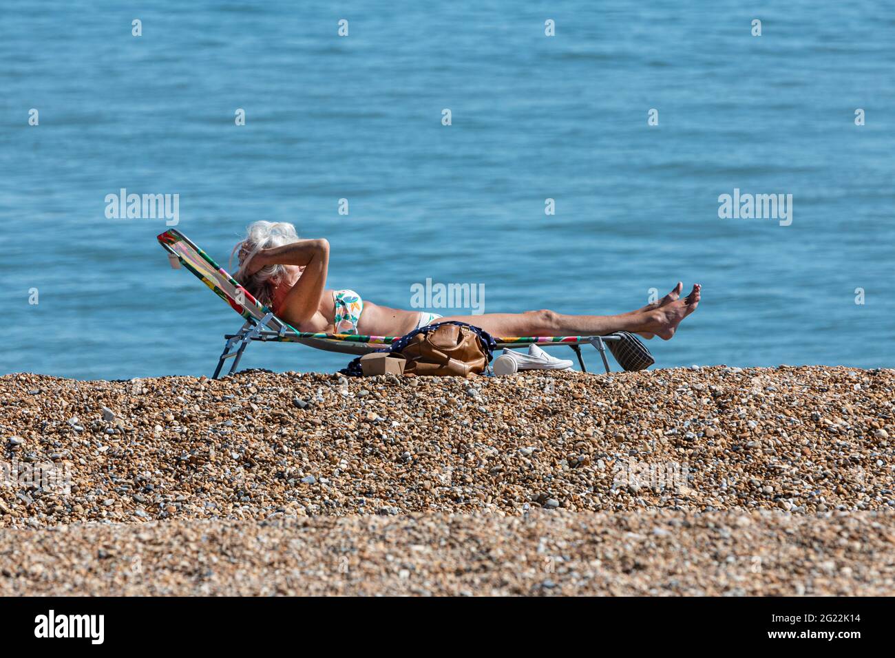Sunbathing summers hi-res stock photography and images - Alamy