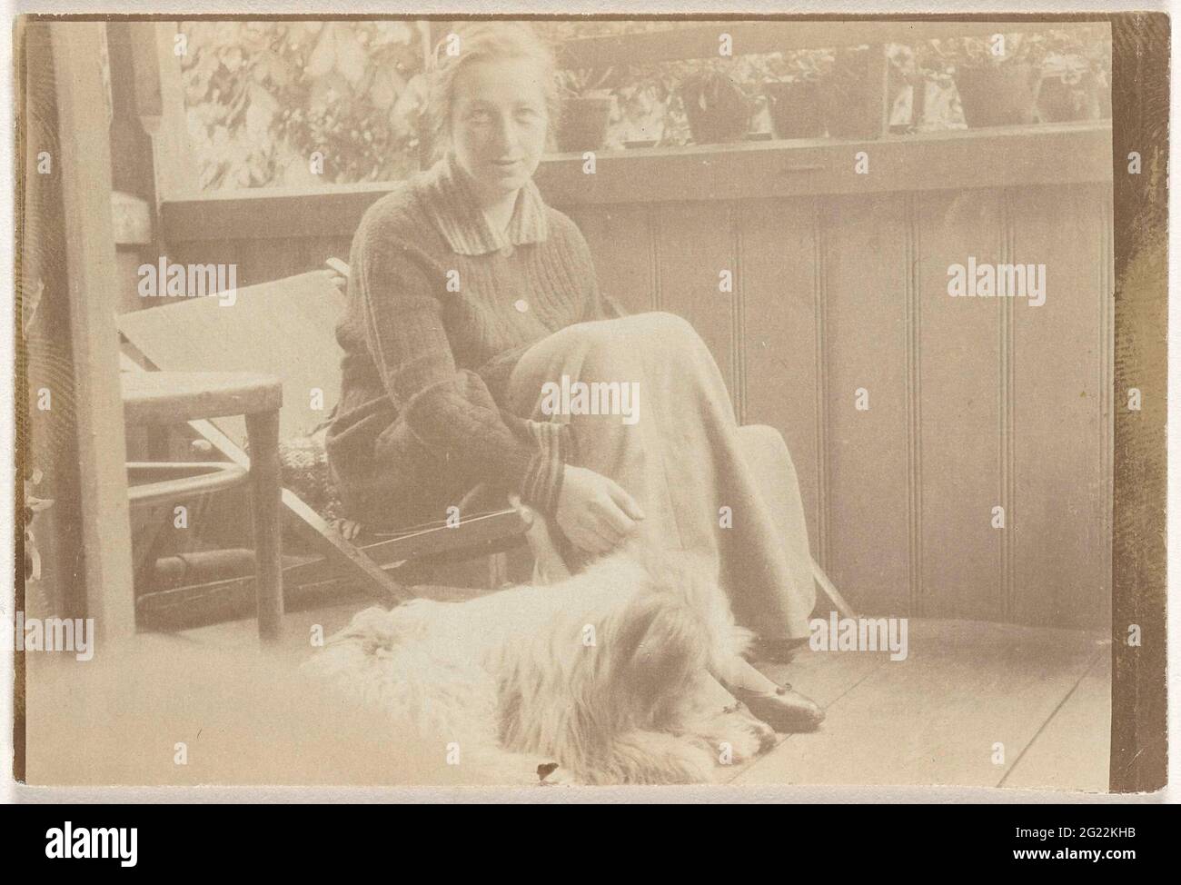 Portrait of irene with dog Stock Photo - Alamy