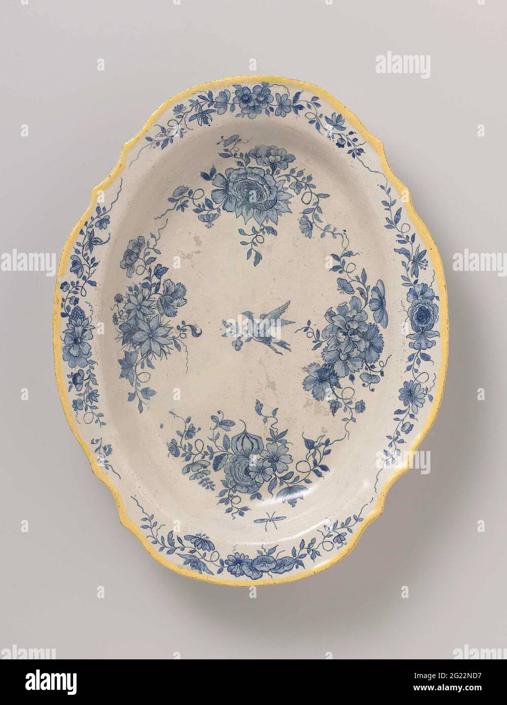 Scale, labeled AB. Scale with a scalloped, yellow edge, painted in blue ...