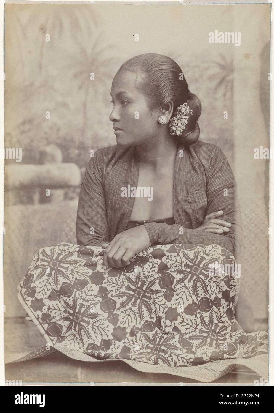 Studio portrait of a sitting Javanese woman Stock Photo - Alamy