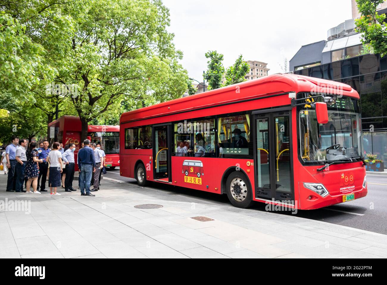 SHANGHAI, CHINA - JUNE 8, 2021 - Some citizens pose for a group photo ...