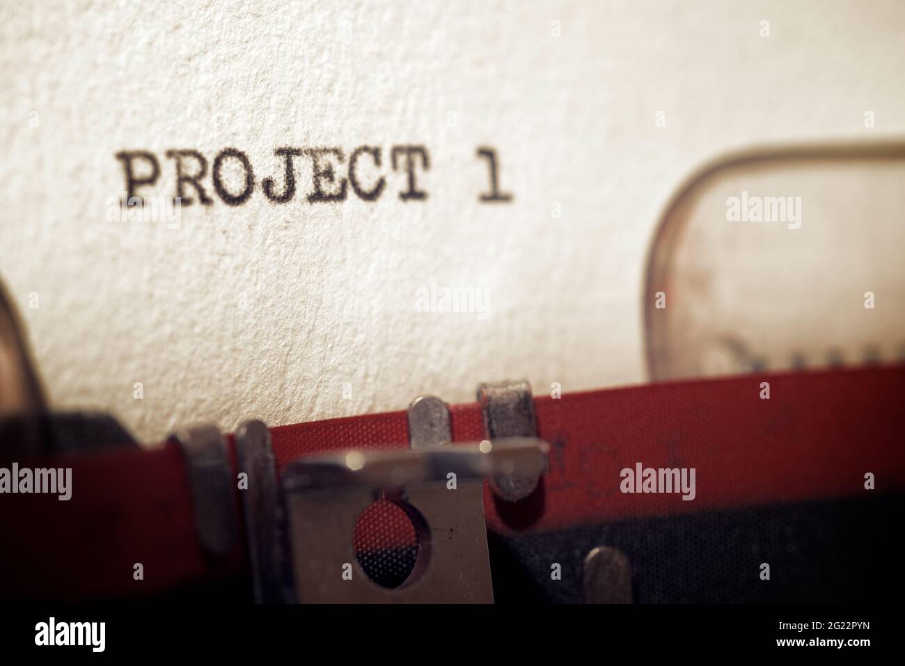 Project 1 text written with a typewriter Stock Photo - Alamy