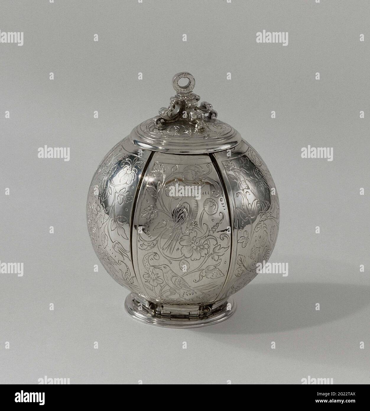 Pomander. Pomander of silver, on profile rim and opened in six segments ...