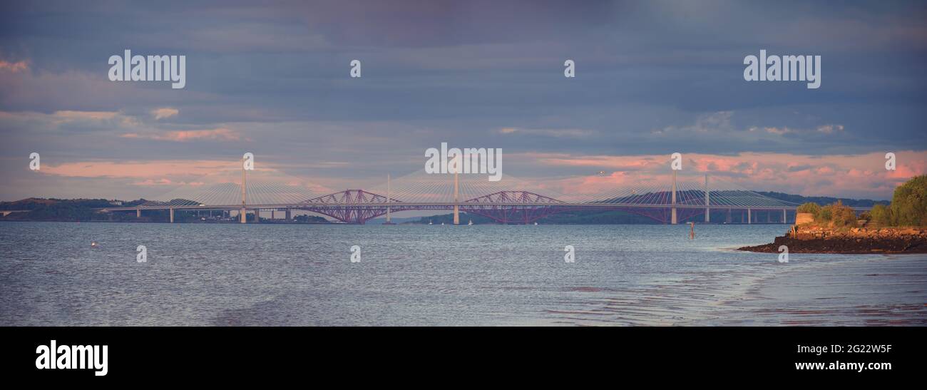 Panorama of three bridges against the sunset sky. Firth of Forth. Forth ...