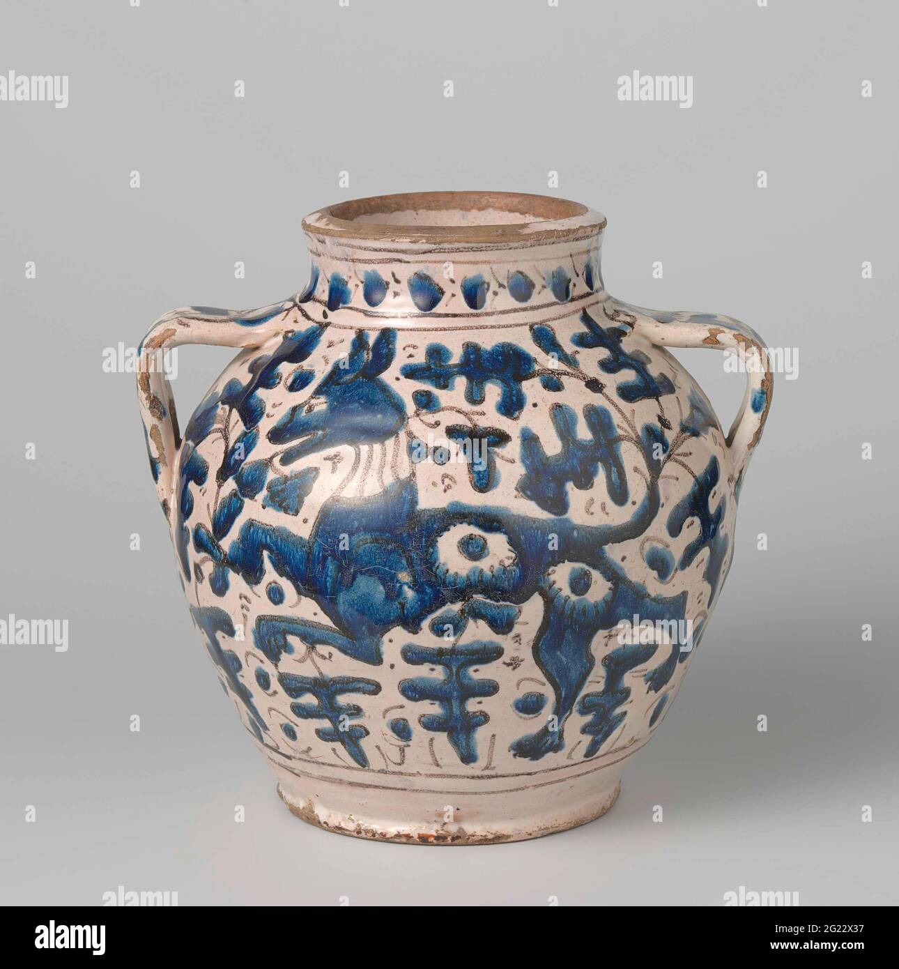 Can with two angulated ears. Spherical pot of blue painted majolica ...