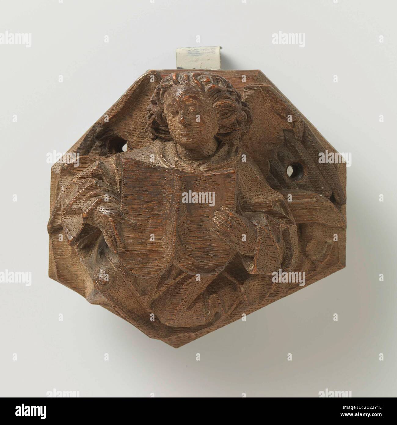 Lock with an angel with coat of arms. Against a flat background in the ...