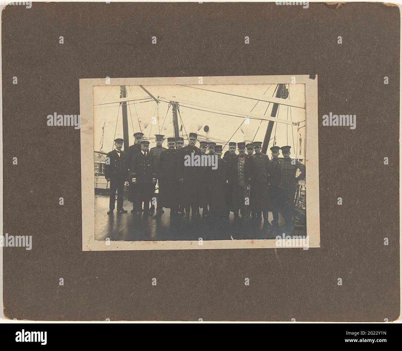 Group portrait of crew on deck of a ship Stock Photo - Alamy
