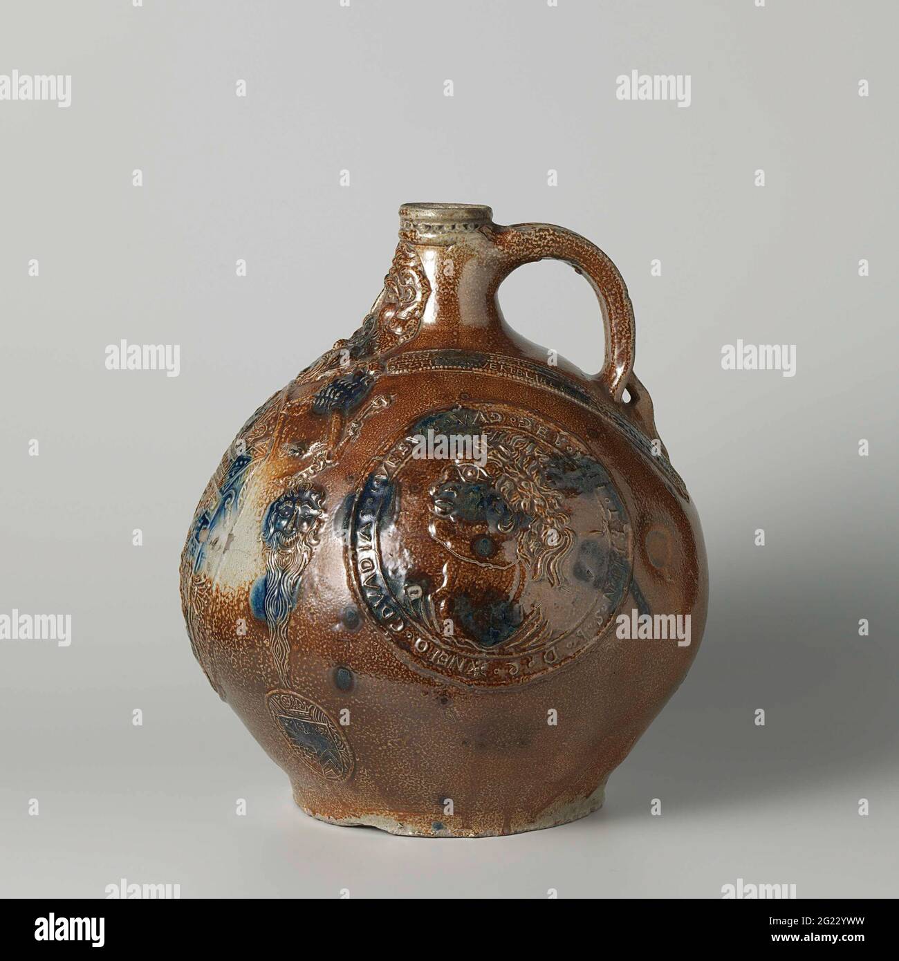 Bearded manner with the year 1607. Bearded manner of stoneware. A ...
