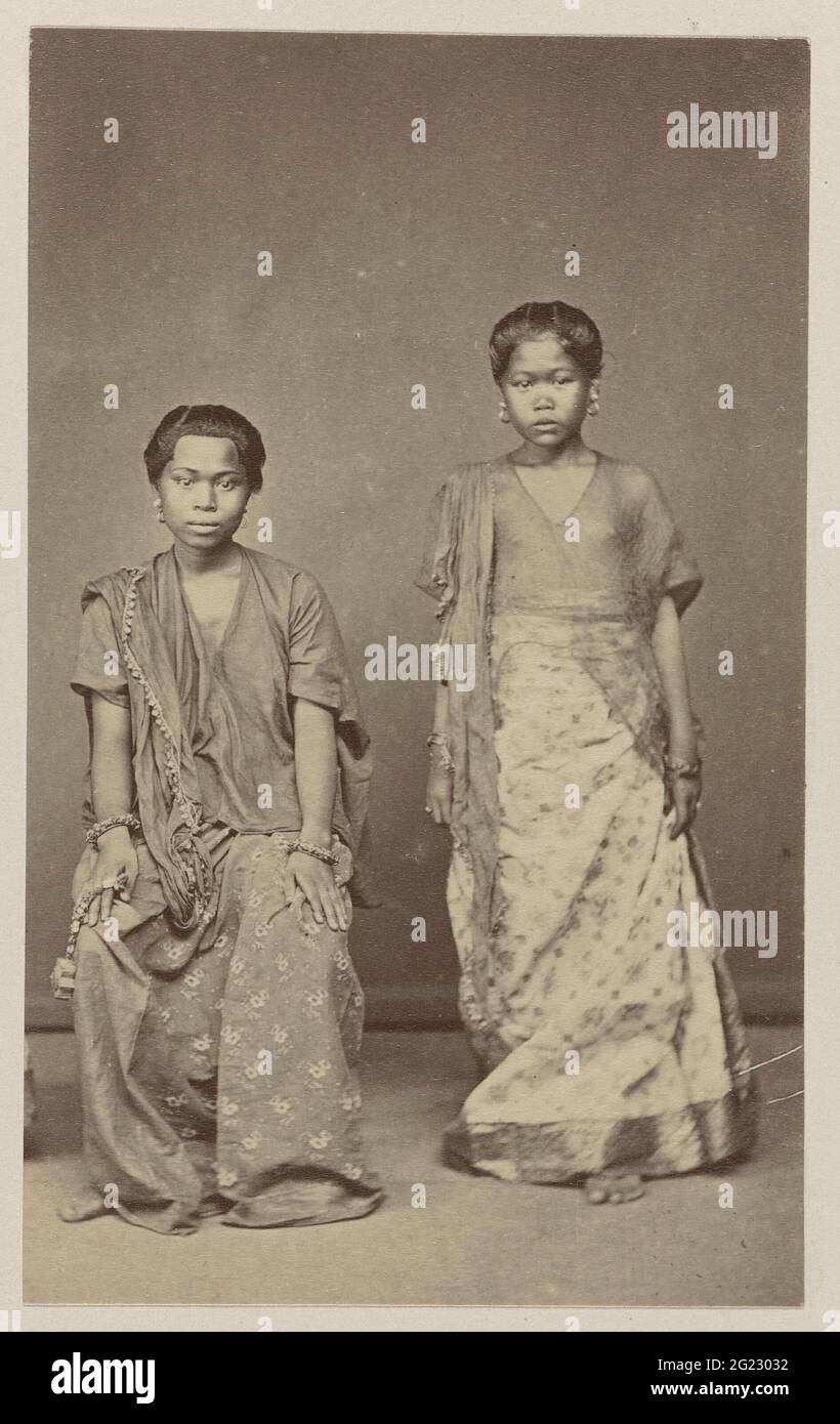Two Javanese girls. Studio portrait of two Javanese girls. Sticked ...