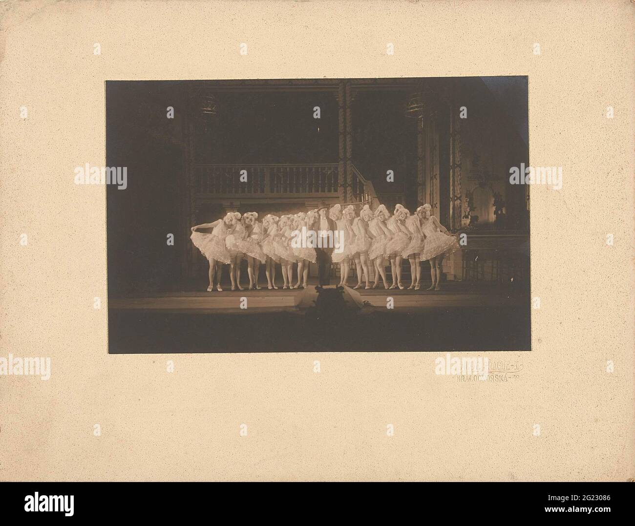 Group Revue Dancers and singer on the stage Stock Photo - Alamy