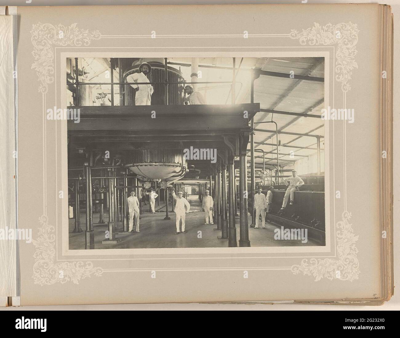 Staff in the sugar factory. European staff posing in a sugar factory ...