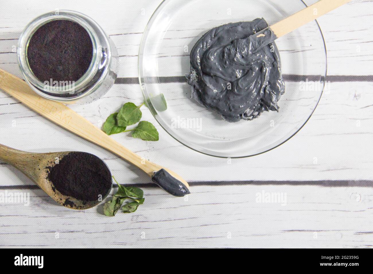 Ingredients for making activated charcoal toothpaste Stock Photo - Alamy