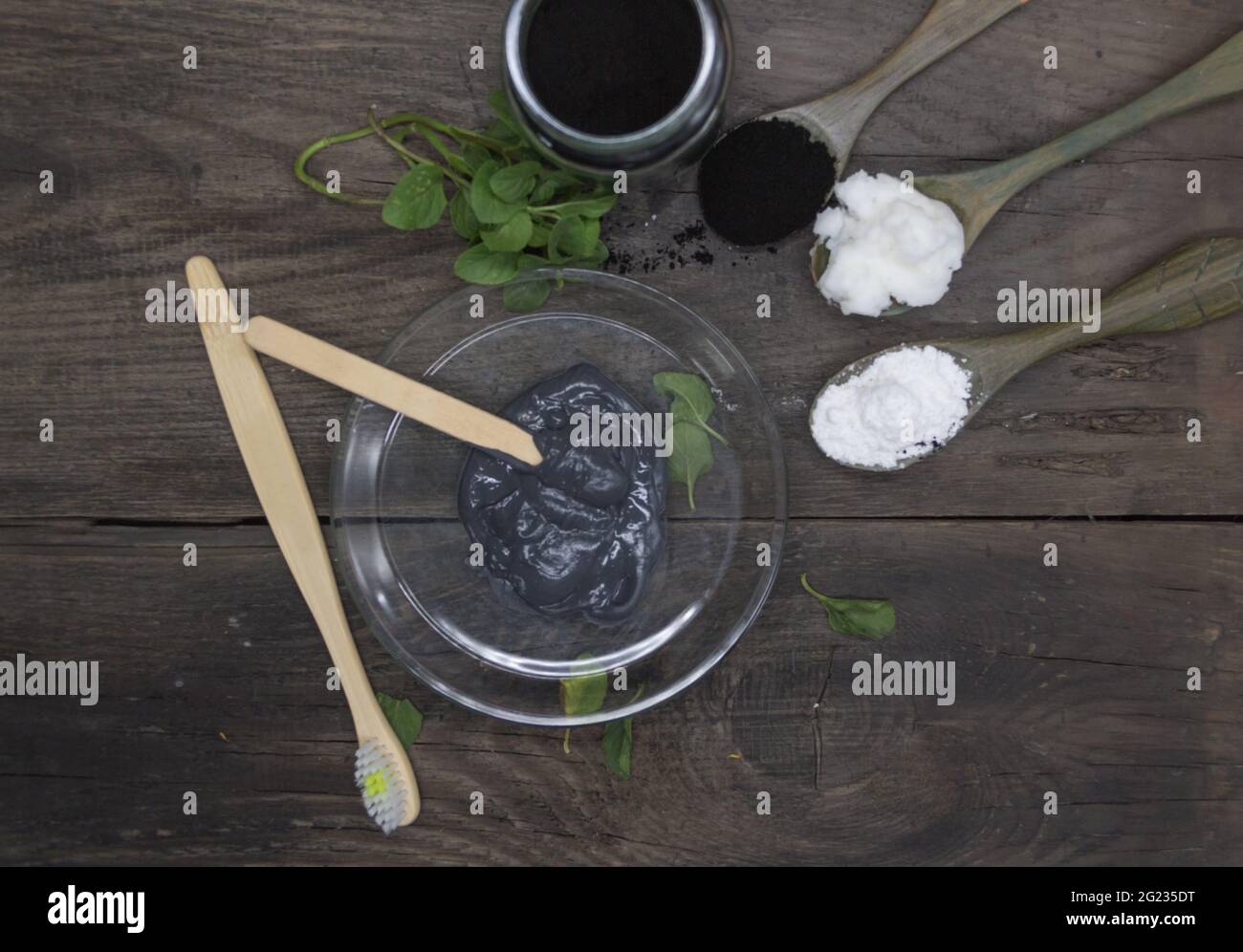 Ingredients for making activated charcoal toothpaste Stock Photo - Alamy