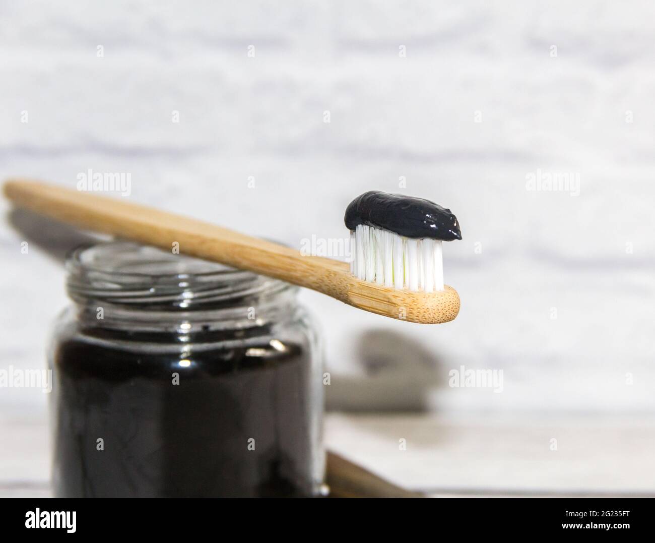 Toothbrush black charcoal toothpaste hi-res stock photography and ...