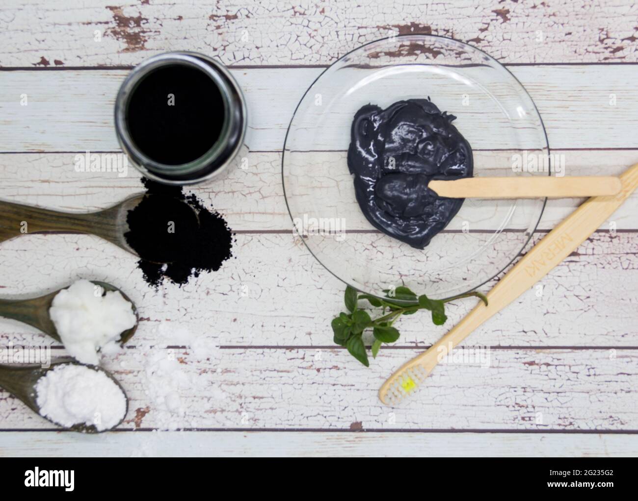 Ingredients for making activated charcoal toothpaste Stock Photo - Alamy