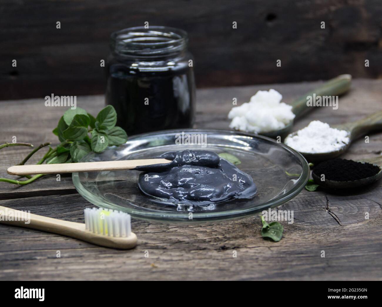 Ingredients for making activated charcoal toothpaste Stock Photo - Alamy