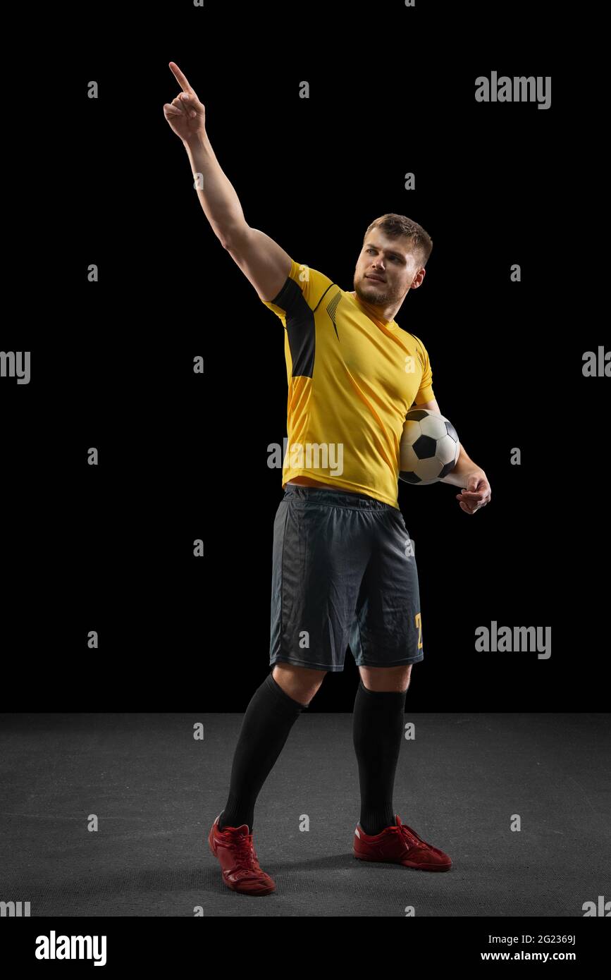 The male unhappy soccer or football player arguing with a judge. The ...