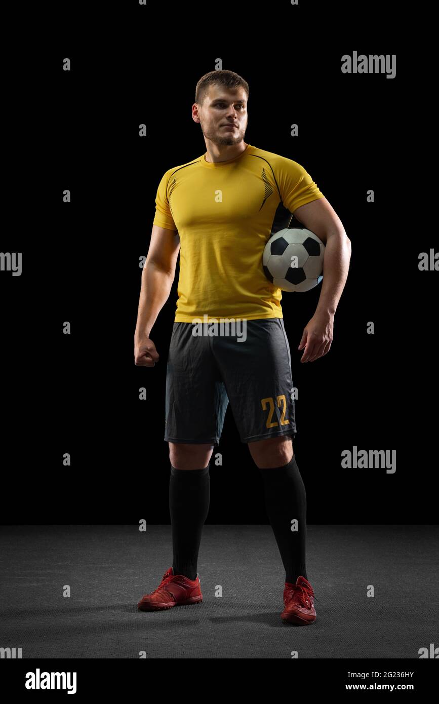 Professional caucasian football soccer player standing isolated on ...