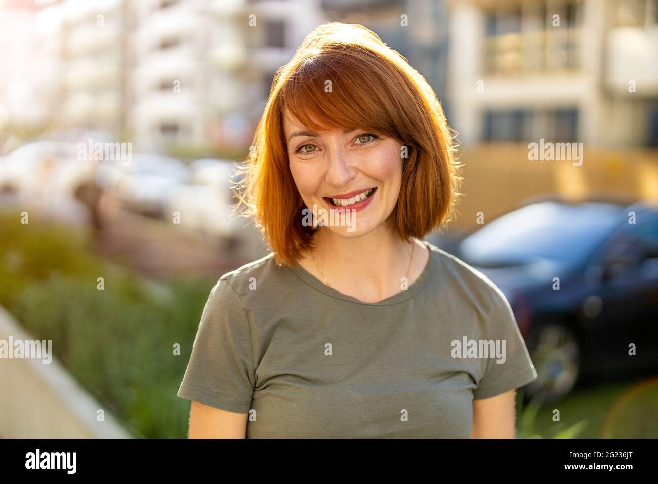 Smiling redheaded woman hi-res stock photography and images - Alamy