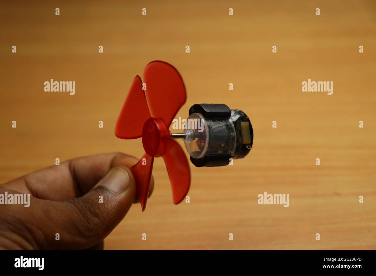 Transparent type dc motor with attached propeller to its shaft. Hobby ...