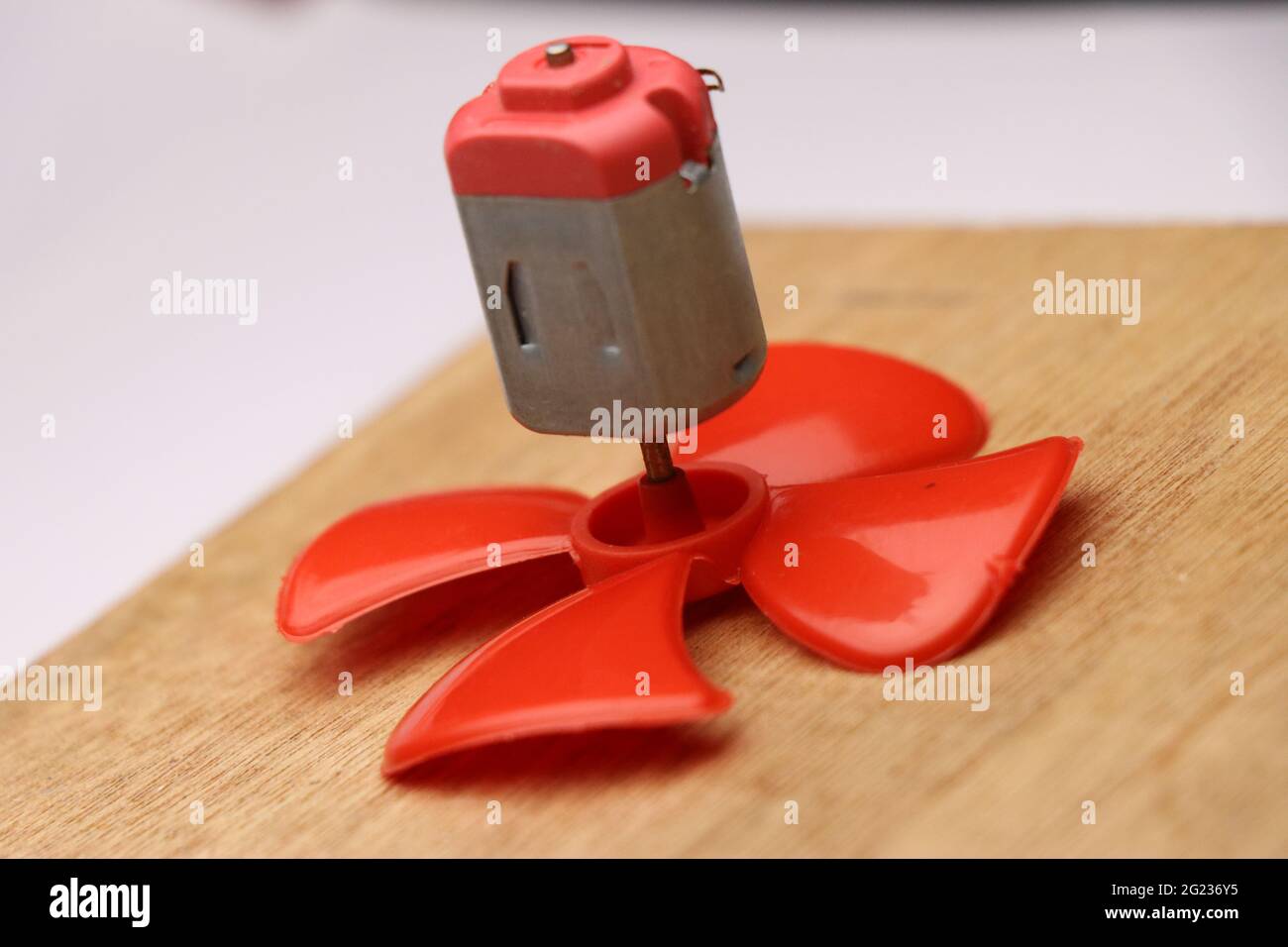 Red plastic propeller attached to motor shaft showing do it yourself ...