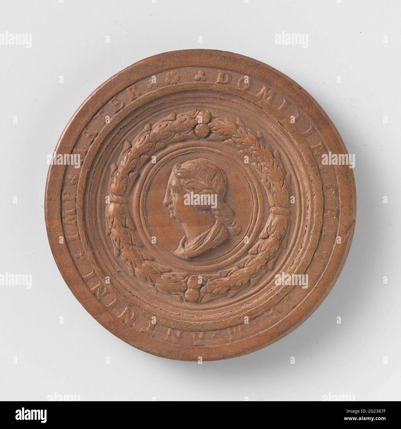 Half of desk disc with portrait: Domitia Calvilla. Domita. Calvilla.m ...