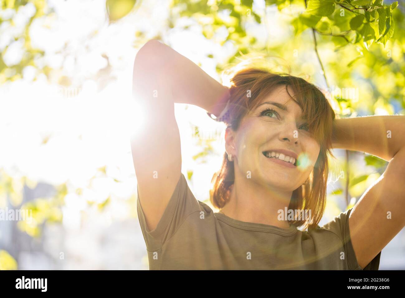 Happy woman outdoors hi-res stock photography and images - Alamy