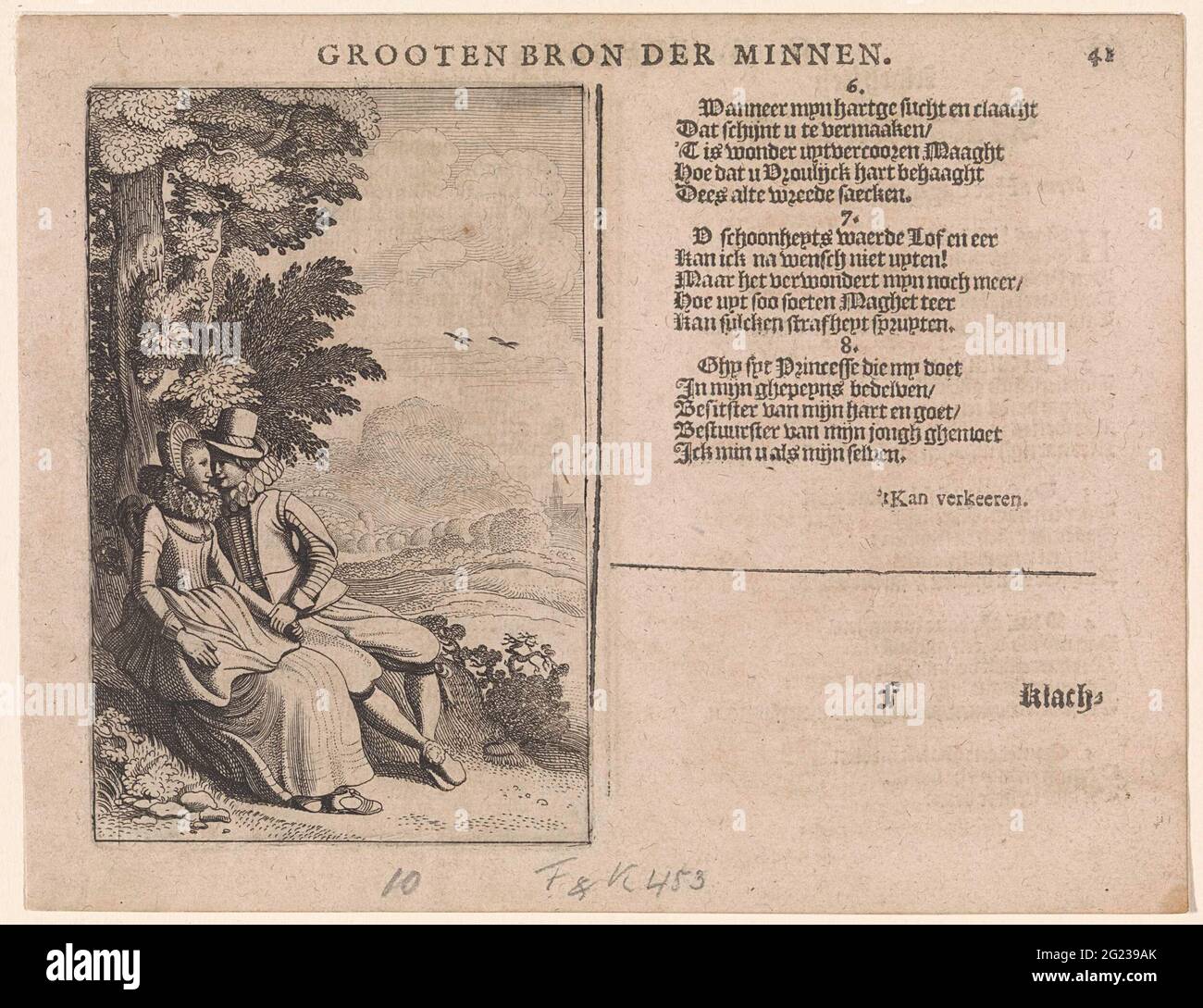 Love couple under a tree. An elegantly dressed minne coating couple ...