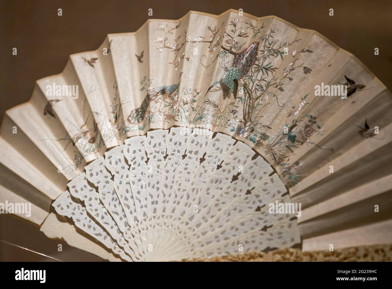 Close-up detail of a folding fan in Lingnan style, Guangdong, China ...