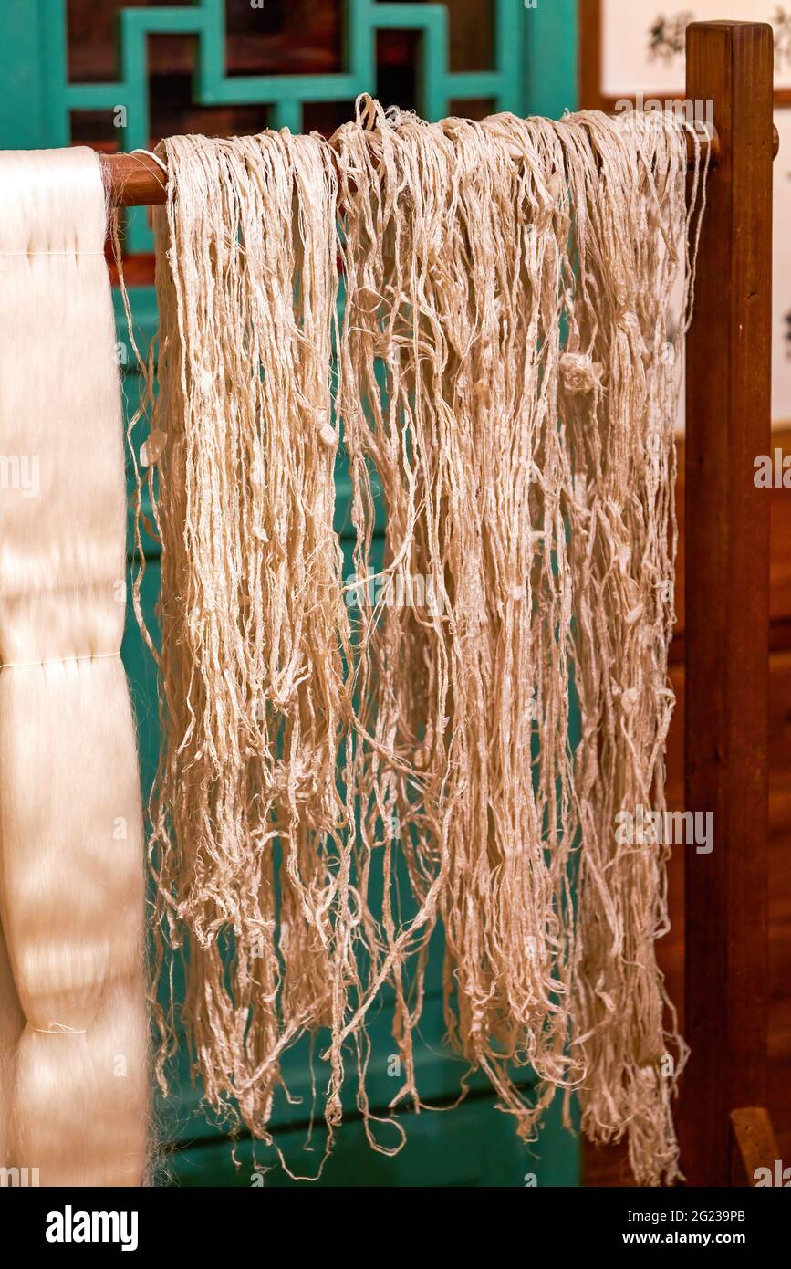 A bundle of cotton hemp rope and silk raw material close-up Stock Photo ...