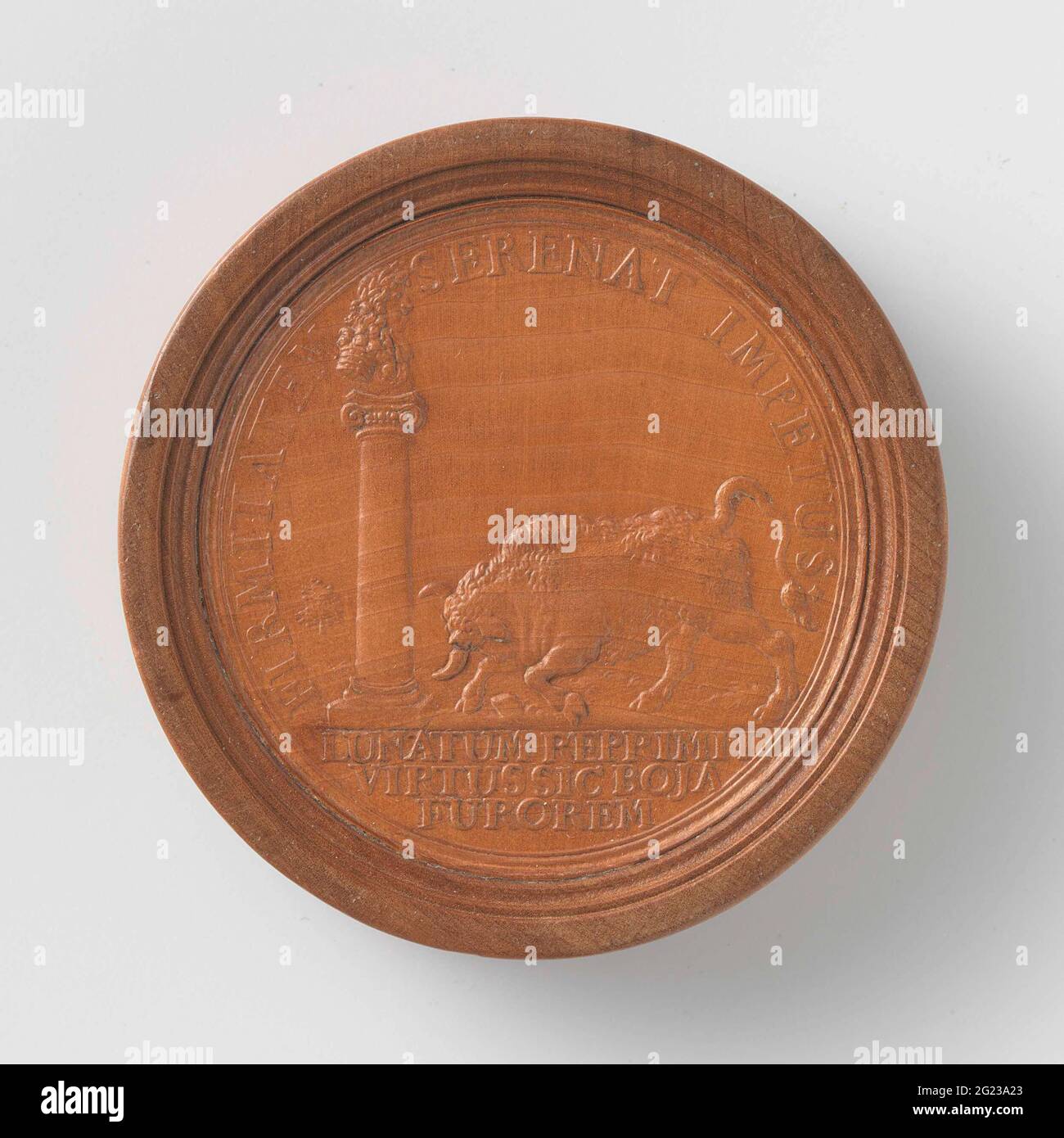 Sculpture of bull. Image of a bull and column with bust. On the back a ...