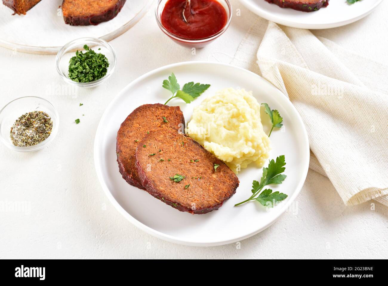 Meatloaf with mashed potato on plate over white background. Tasty ...