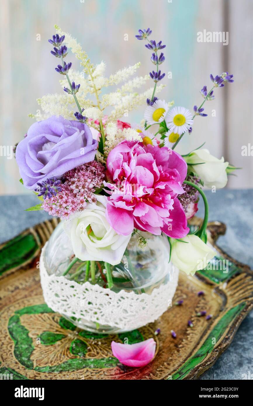 Bouquet with rose, peony, eustoma and lavender flowers. Party decor ...