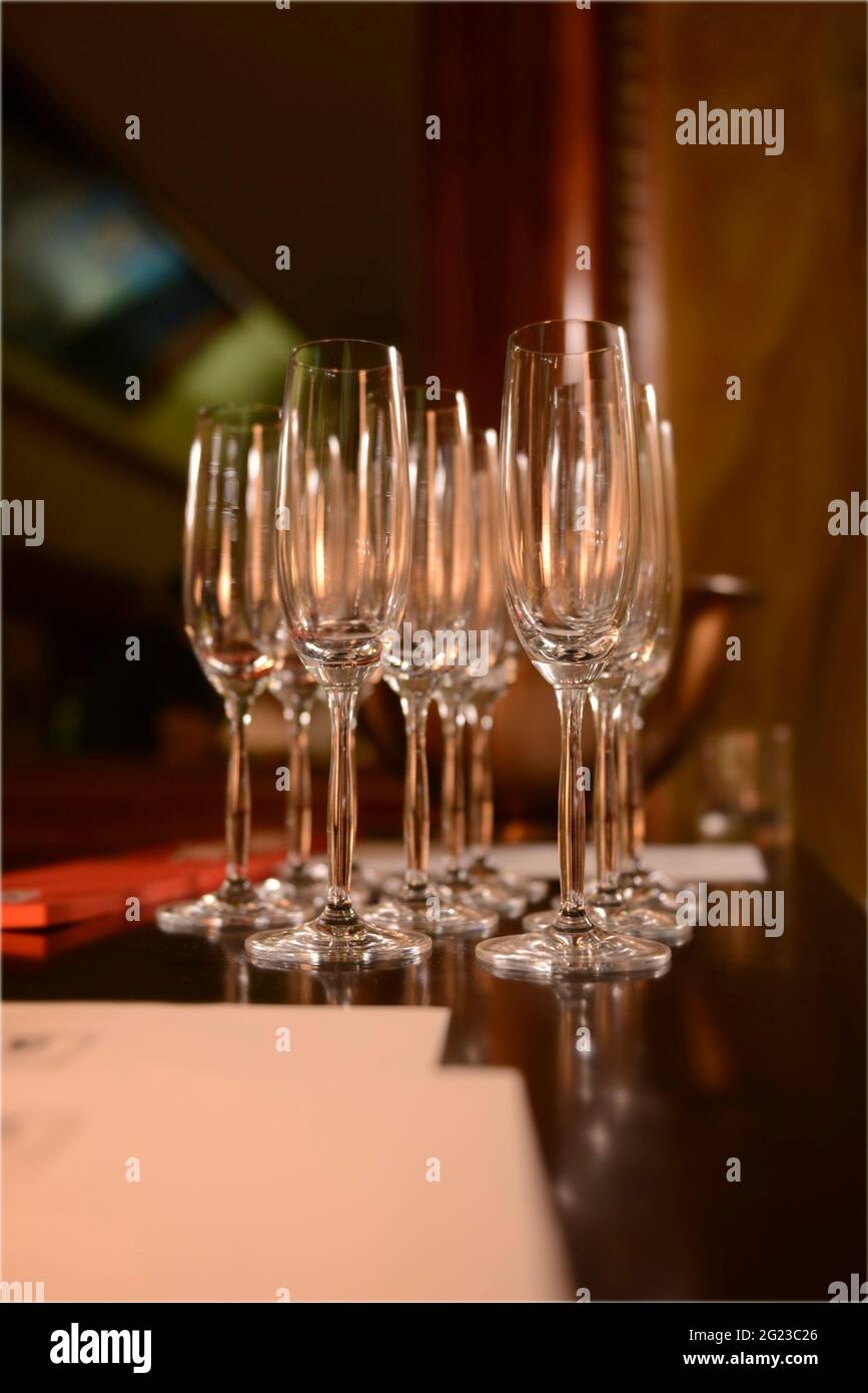 Empty glasses on the counter Stock Photo - Alamy