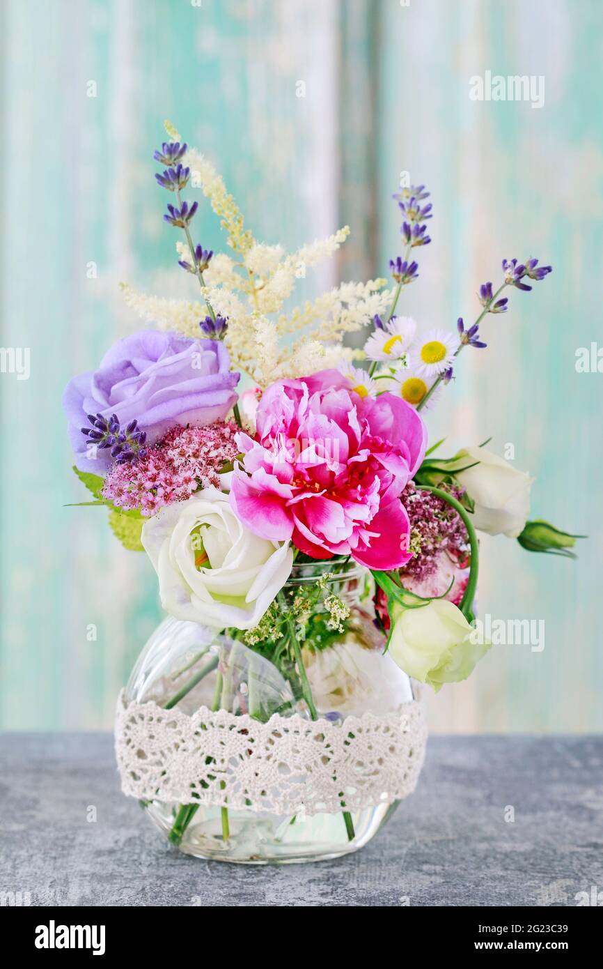 Bouquet with rose, peony, eustoma and lavender flowers. Party decor ...