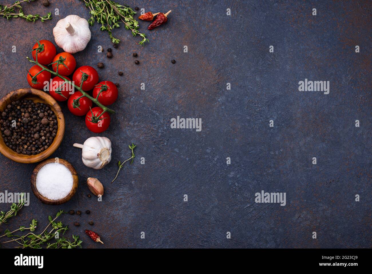 Tomatoes, thyme, garlic and spices Stock Photo - Alamy