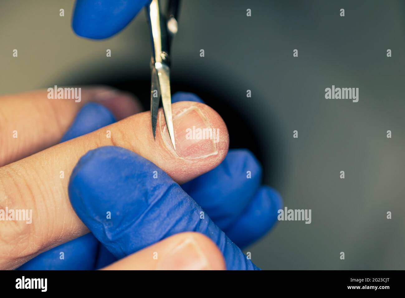 The man on procedures in manicure salon. Spa, manicuring, removal of ...