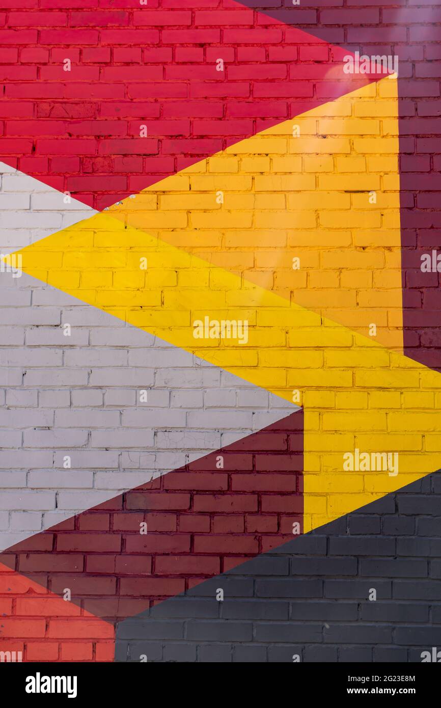 Colorful grey, red, yellow brick wall as background, texture Stock ...