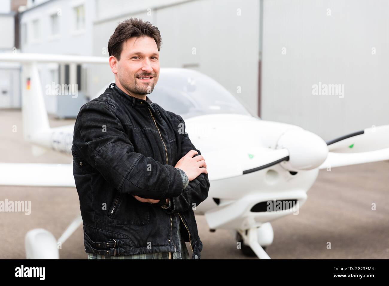 Sport pilot standing in front of his plane Stock Photo - Alamy