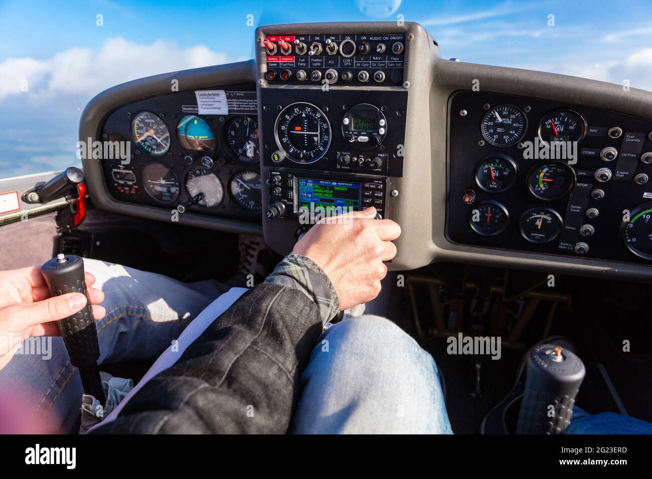 Pilot flying a private sport airplane using the steering stick Stock ...